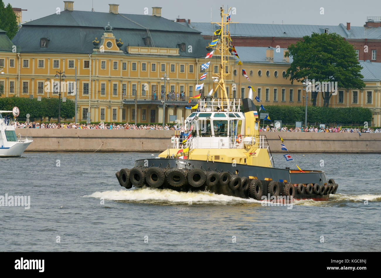 Work boat for towing ships, floating on the river Stock Photo - Alamy
