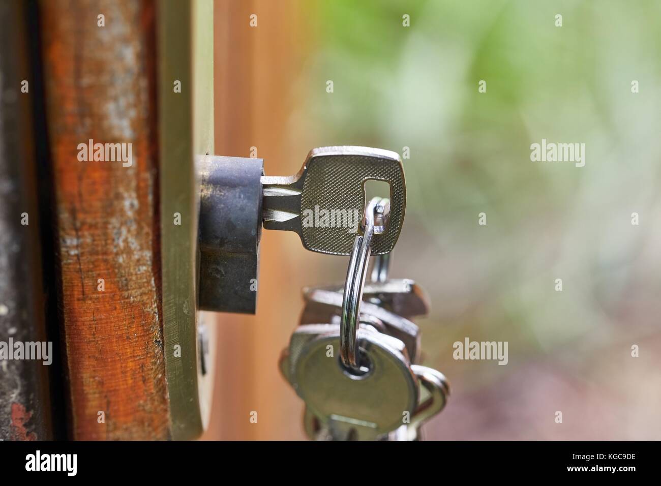 Open garden gate with key Stock Photo - Alamy