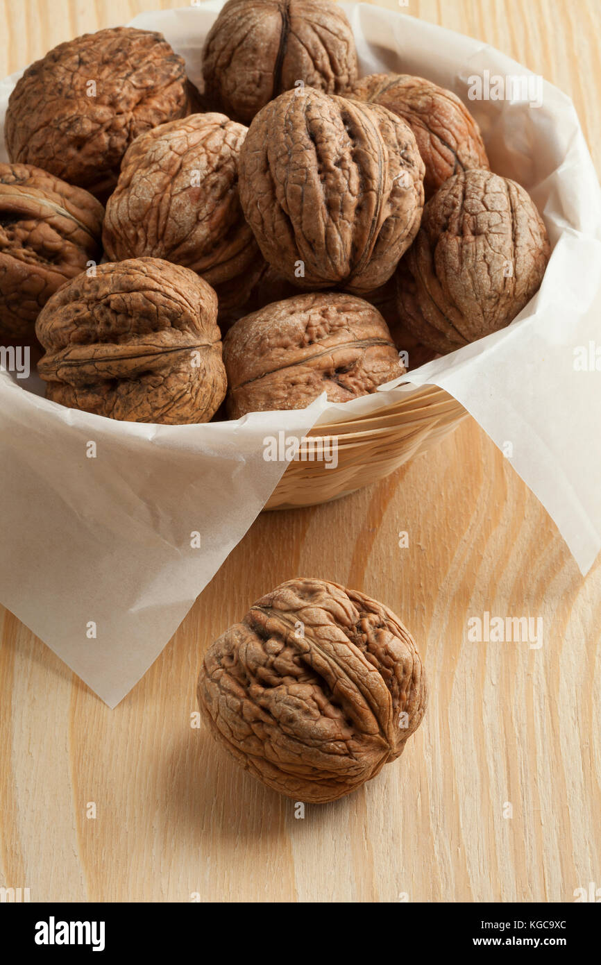 Fresh picked wet walnuts in a basket Stock Photo - Alamy