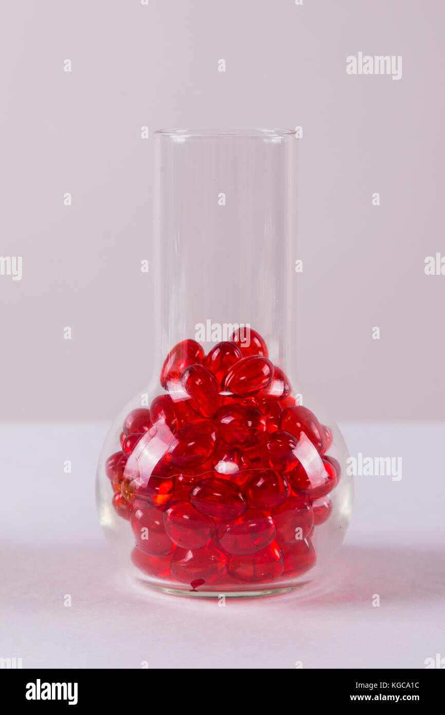 red capsule medical vitro Stock Photo - Alamy