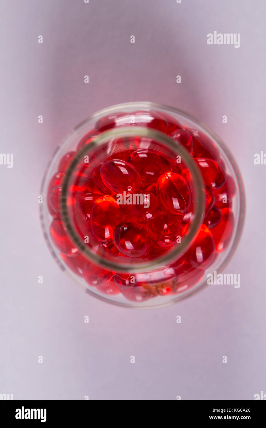 red capsule medical vitro Stock Photo - Alamy