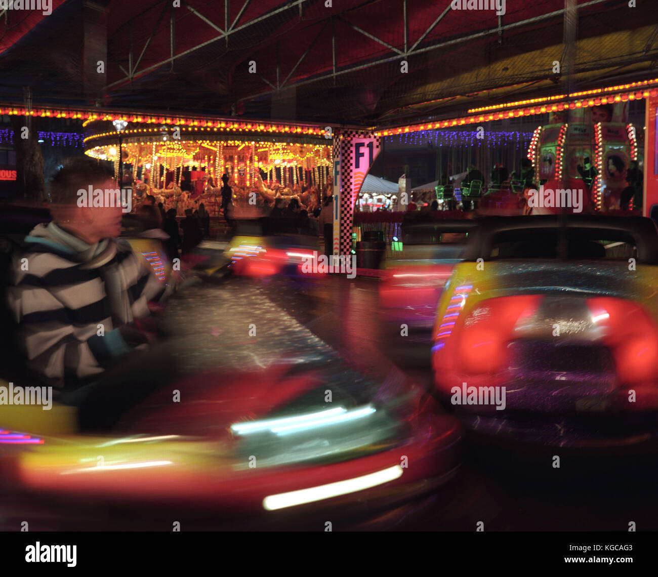 Members of the public enjoy a ride on the dodgems at the Leicester ...