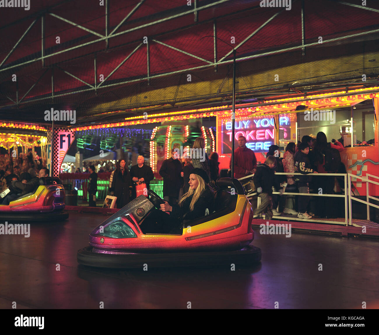 Members of the public enjoy a ride on the dodgems at the Leicester ...