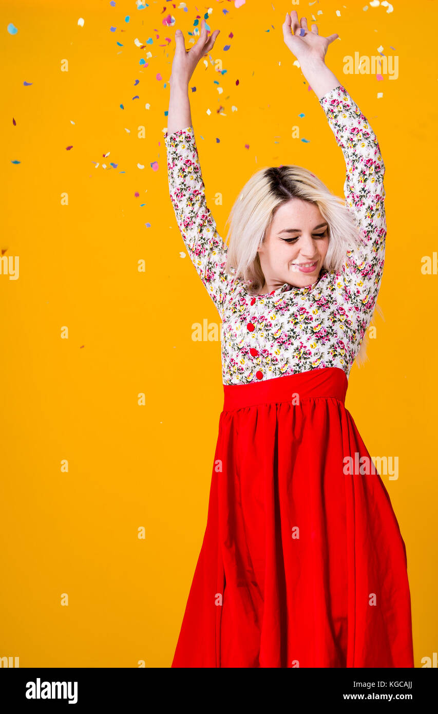 Girl with confetti Stock Photo - Alamy