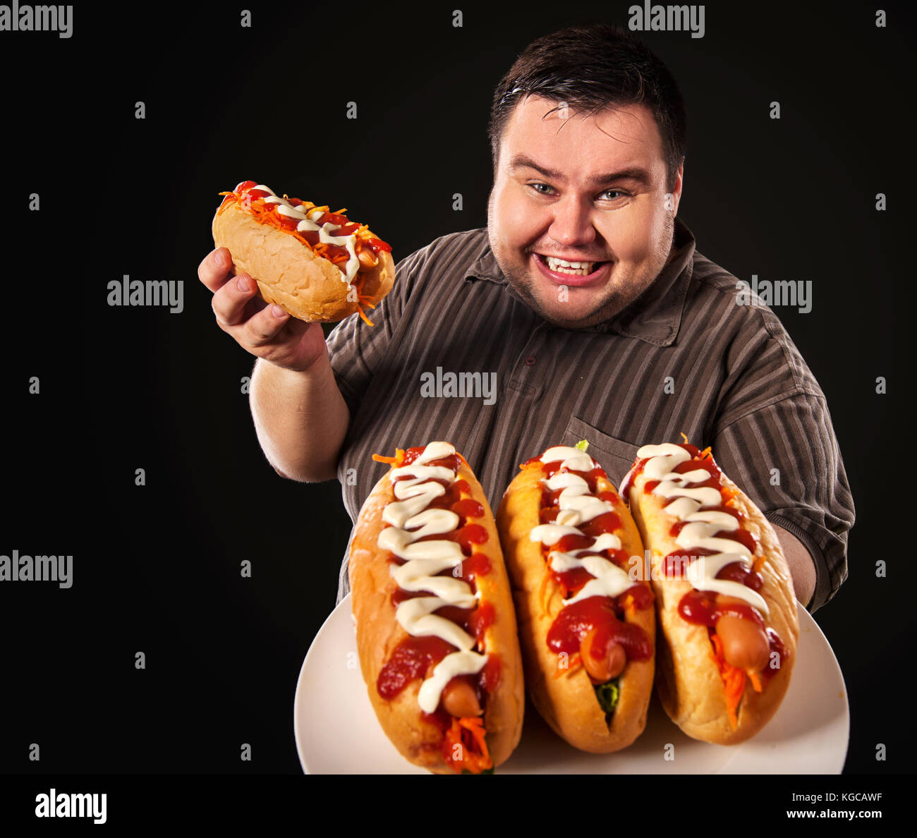Fat Man Eating Chili Dogs