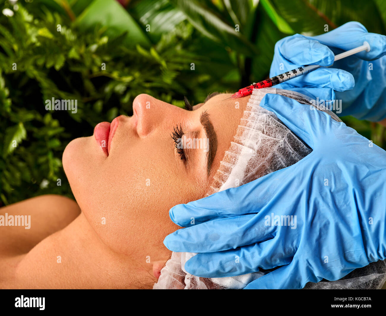 Filler injection for female forehead face. Plastic aesthetic facial ...