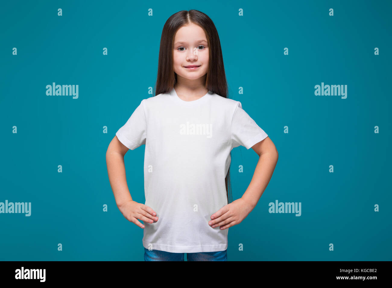 Cute girl in tee shirt with long hair Stock Photo - Alamy