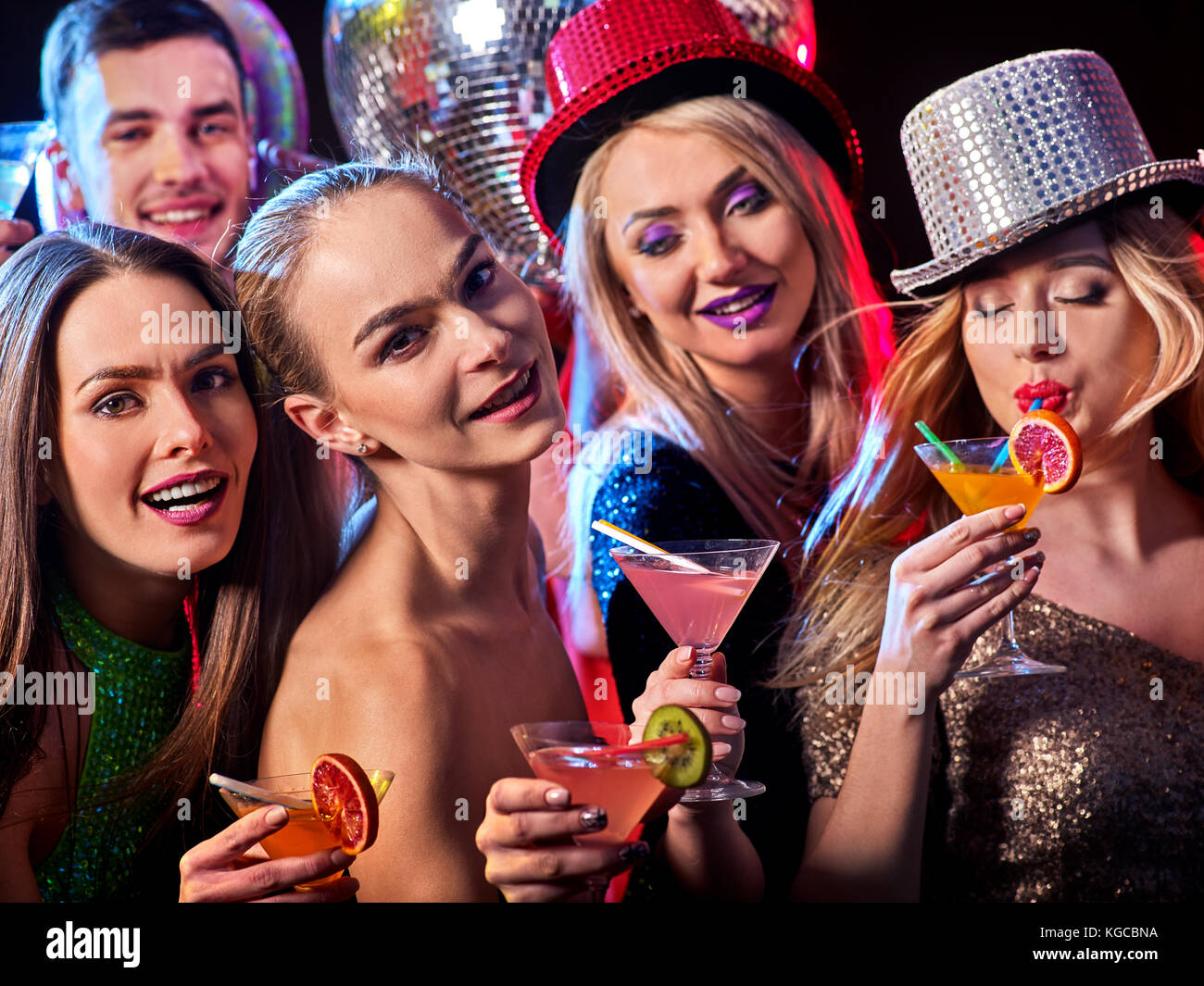 Cocktail party with group people dancing and drink cocktail. Happy ...