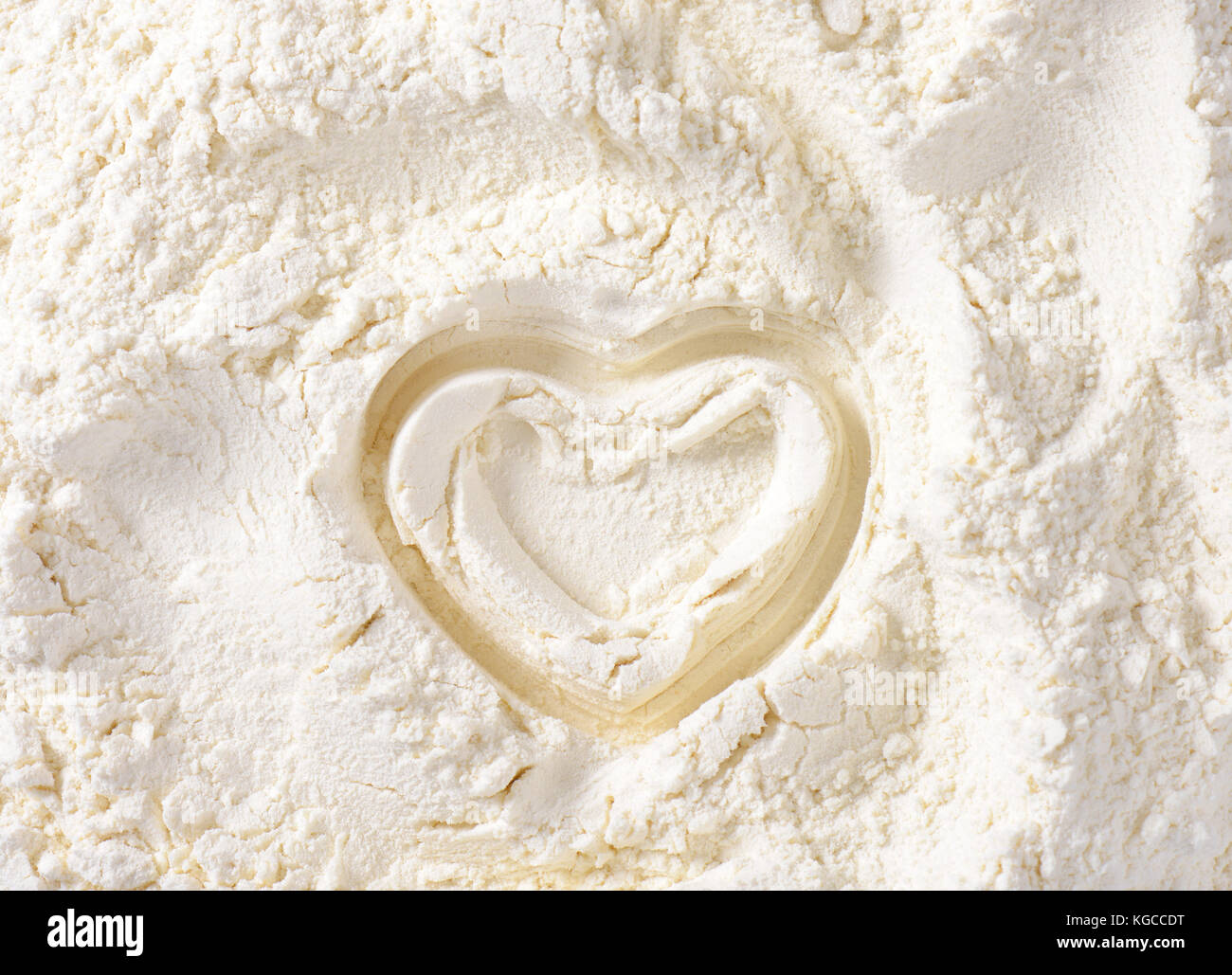 Heart shape drawn in wheat flour Stock Photo - Alamy