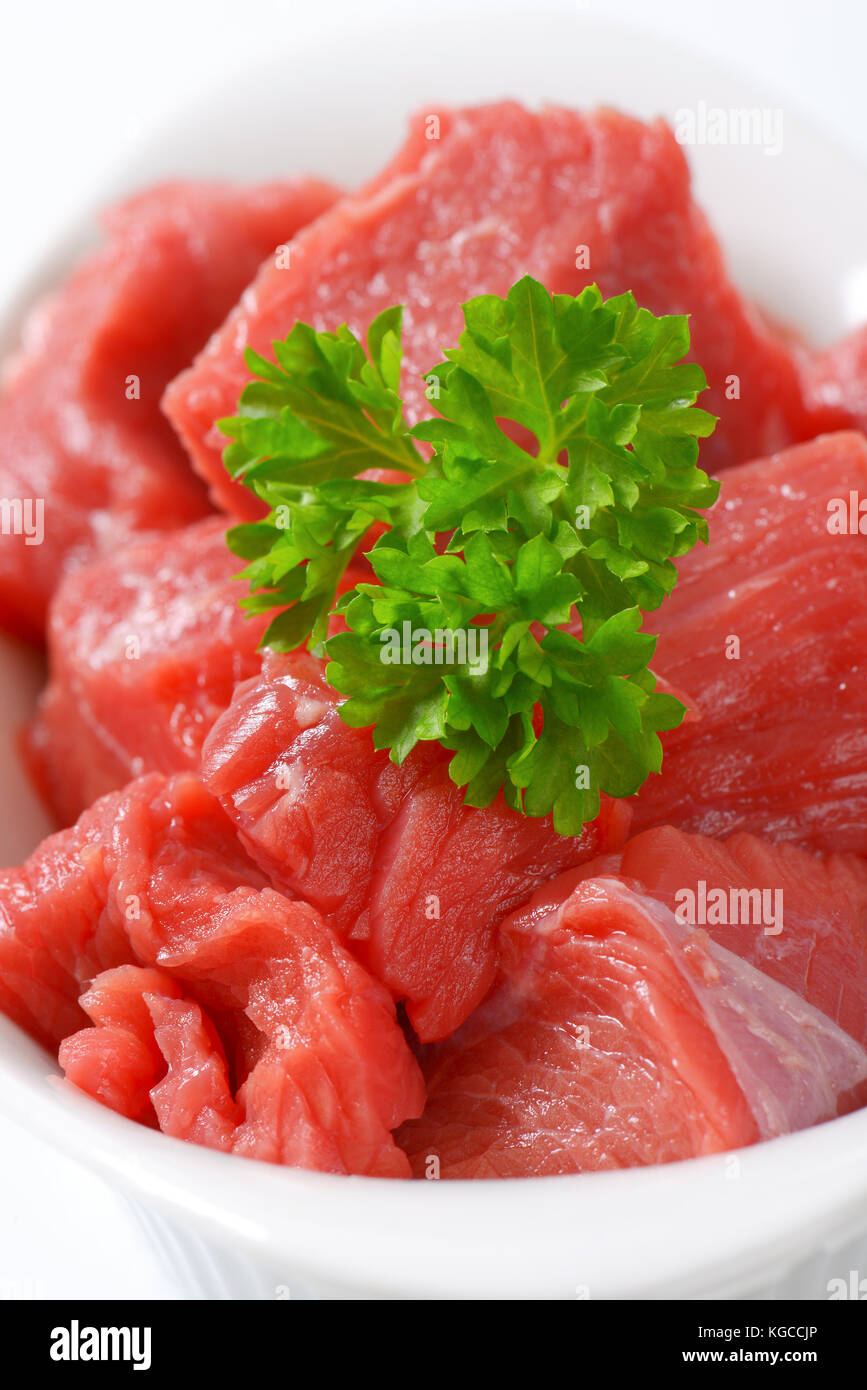 bowl of diced raw beef meat - close up Stock Photo - Alamy