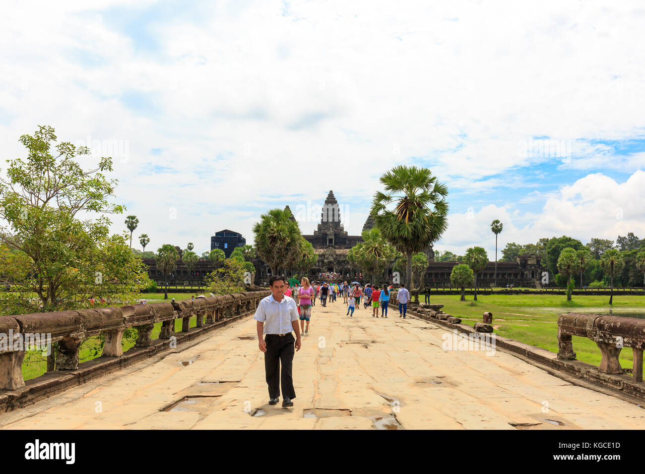 Tourists Walking in Front of Angkor Wat Temple in Cambodia Stock Photo ...