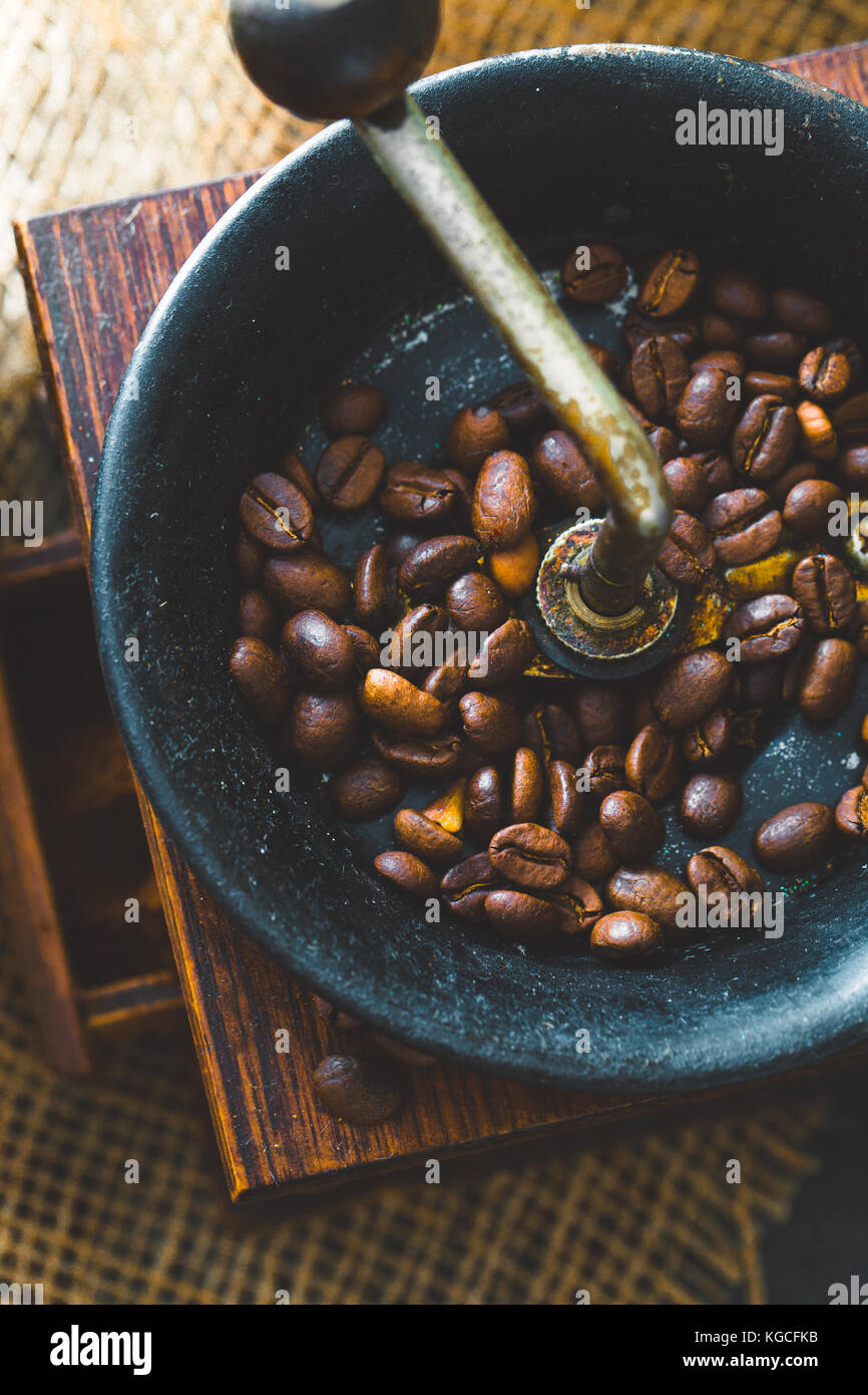 Coffee. Coffee beans on rustic plate Stock Photo - Alamy