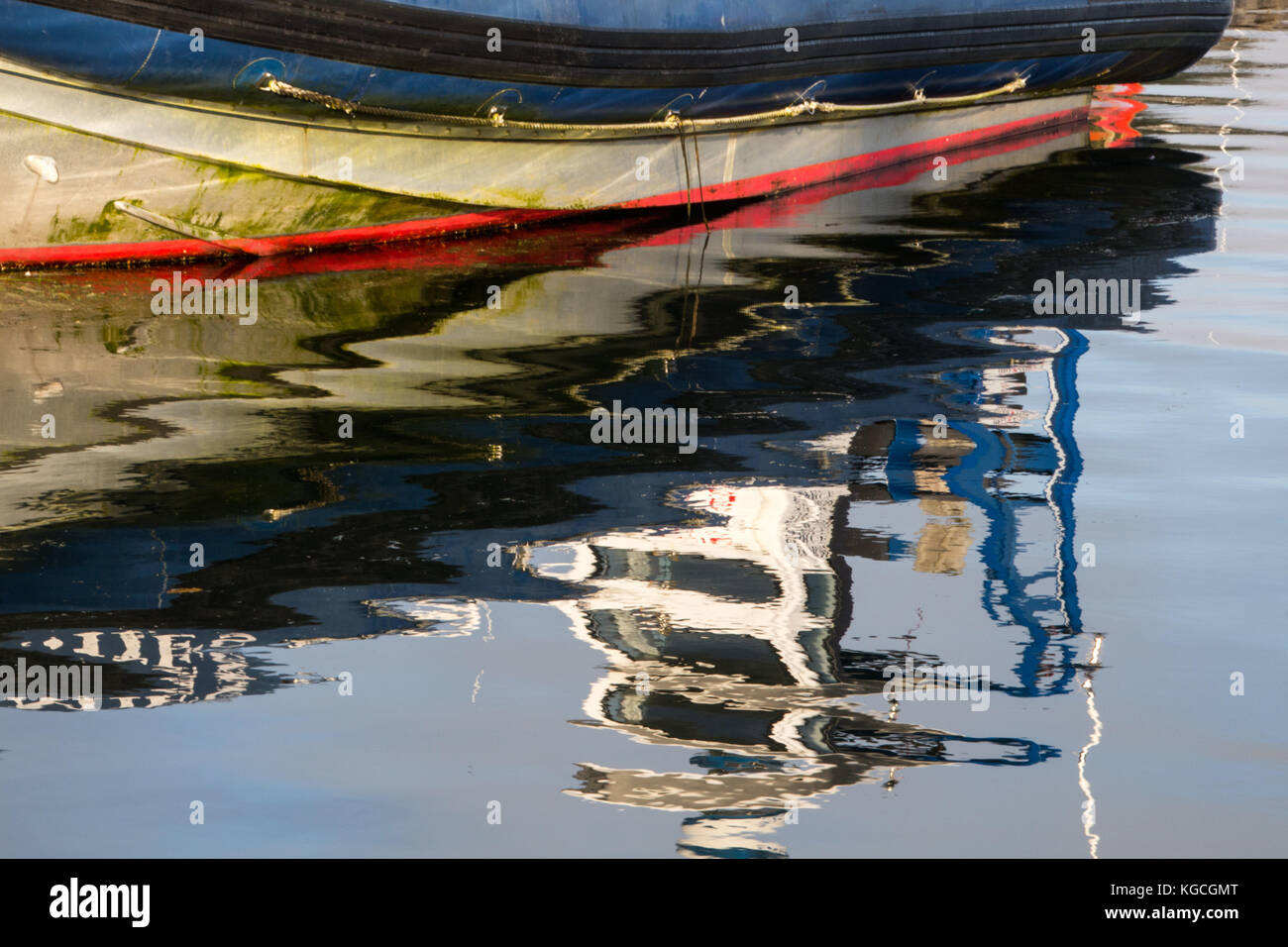A Boat Reflected in the Water Stock Photo - Alamy
