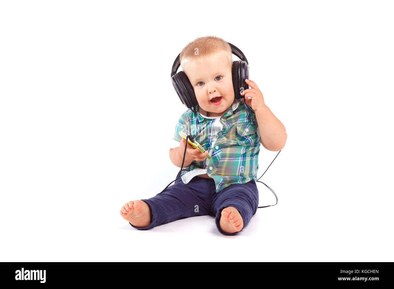 Baby boy with headphones hi-res stock photography and images - Alamy