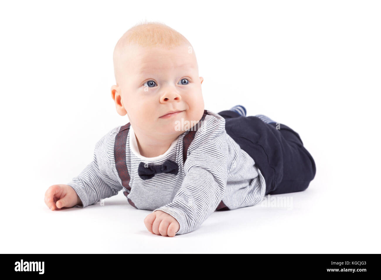 serious cute little boy in strong costume Stock Photo - Alamy