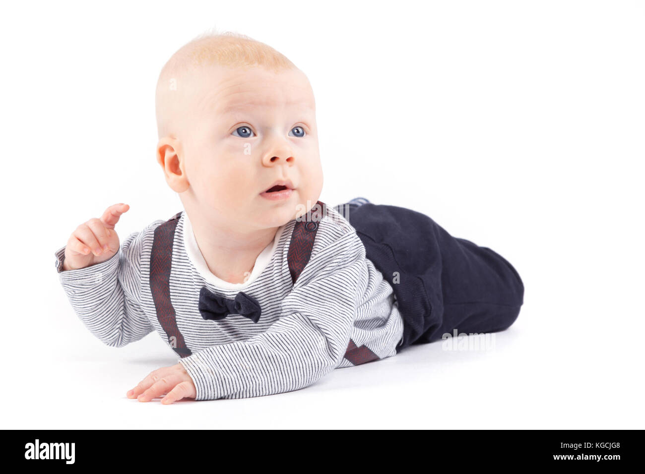 serious cute little boy in strong costume Stock Photo - Alamy
