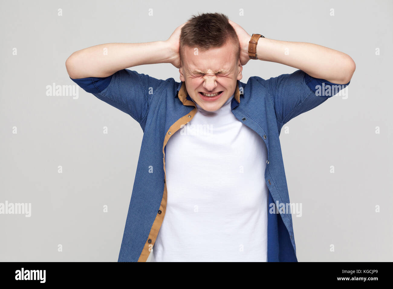 Headache. Boy have a problem or stress. Indoor shot Stock Photo - Alamy