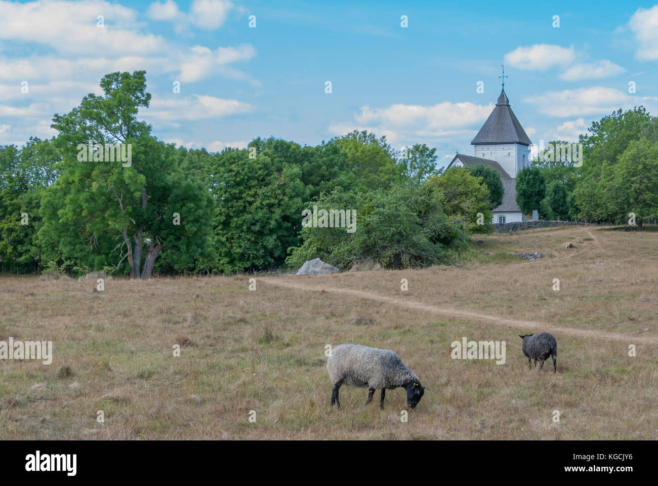 Landscape with church at Hovgarden in Sweden Stock Photo - Alamy