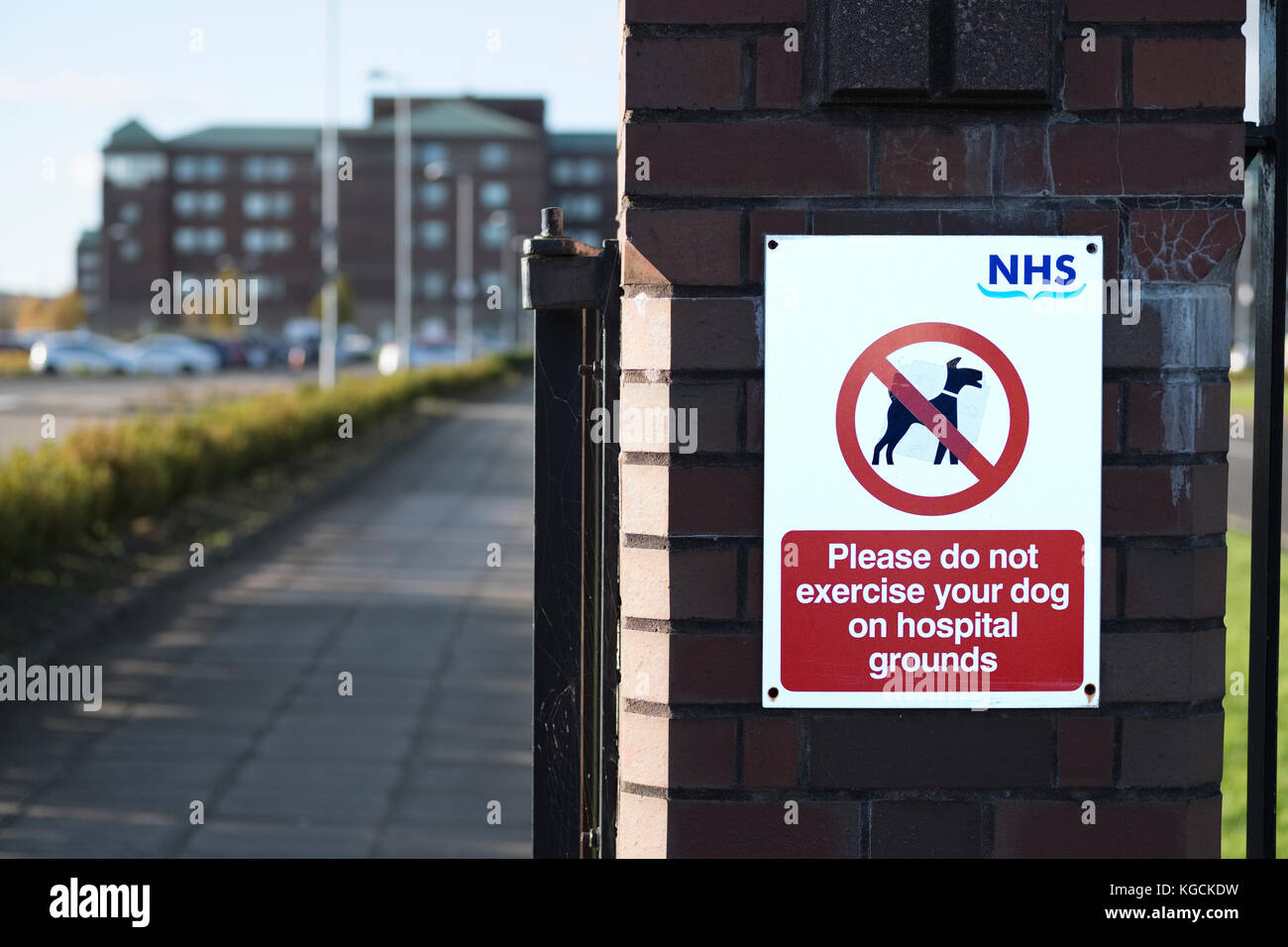 Please Do Not Exercise Your Dog On NHS Hospital Grounds Sign Stock ...