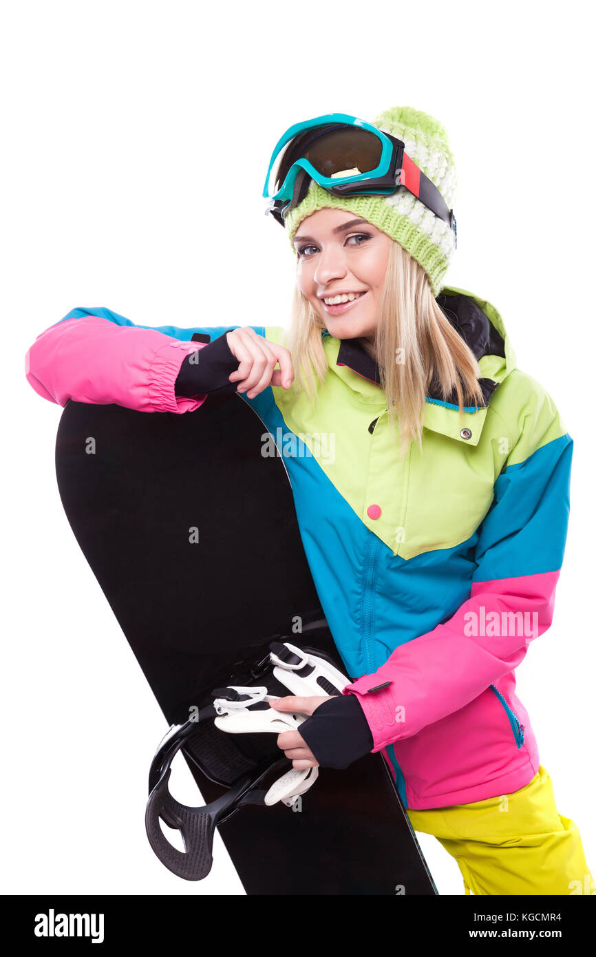 pretty young woman in ski outfit hold snowboard Stock Photo - Alamy