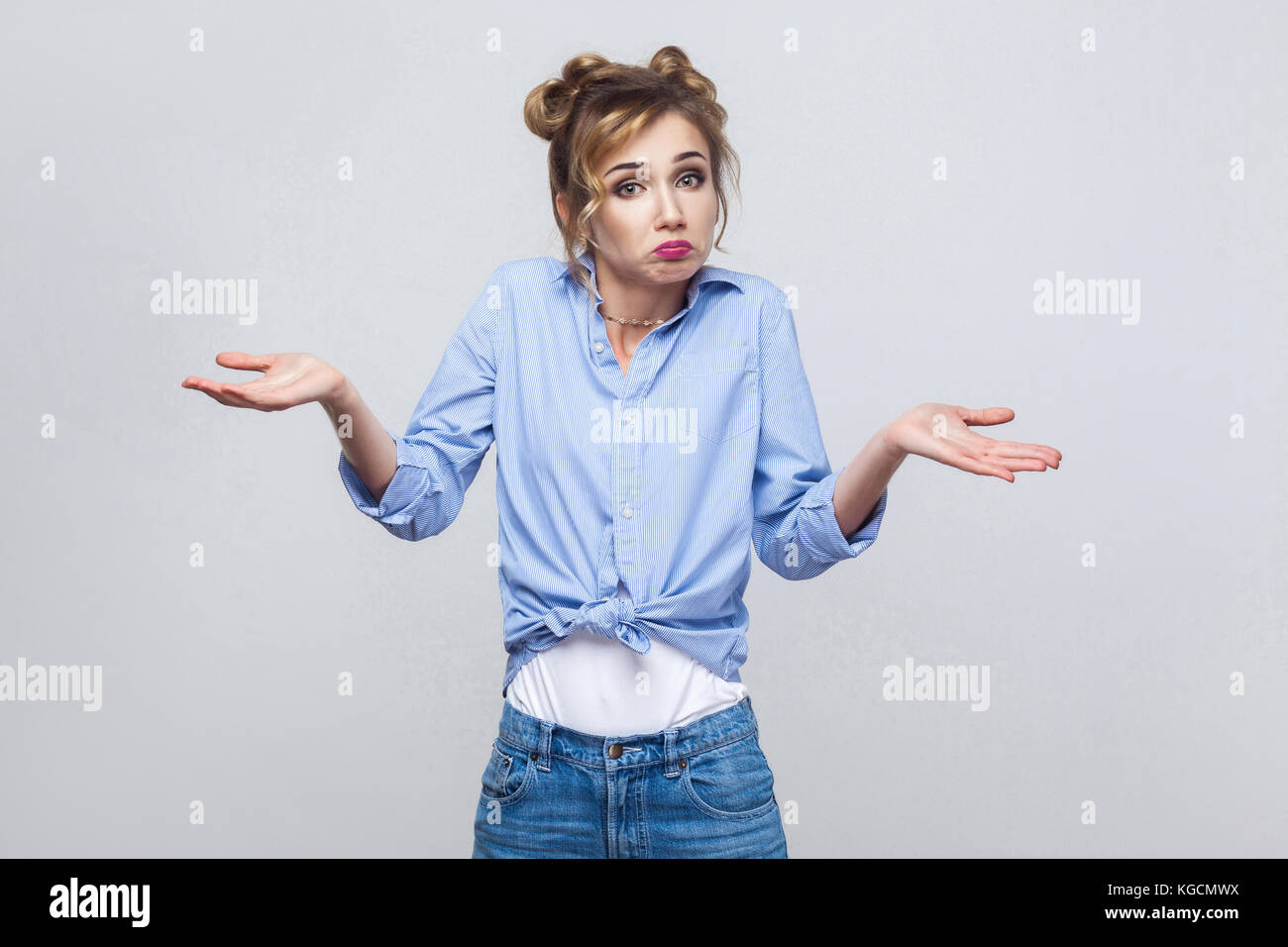 Negative human emotions, facial expressions. Puzzled young adult woman ...