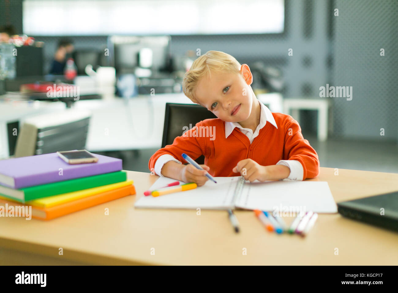 Boy draw in the office Stock Photo - Alamy