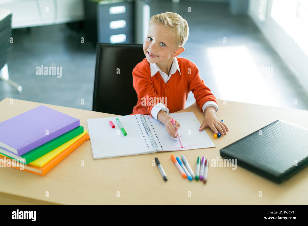Boy draw in the office Stock Photo - Alamy