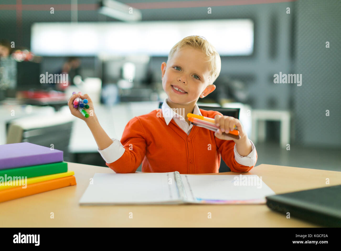Boy draw in the office Stock Photo - Alamy