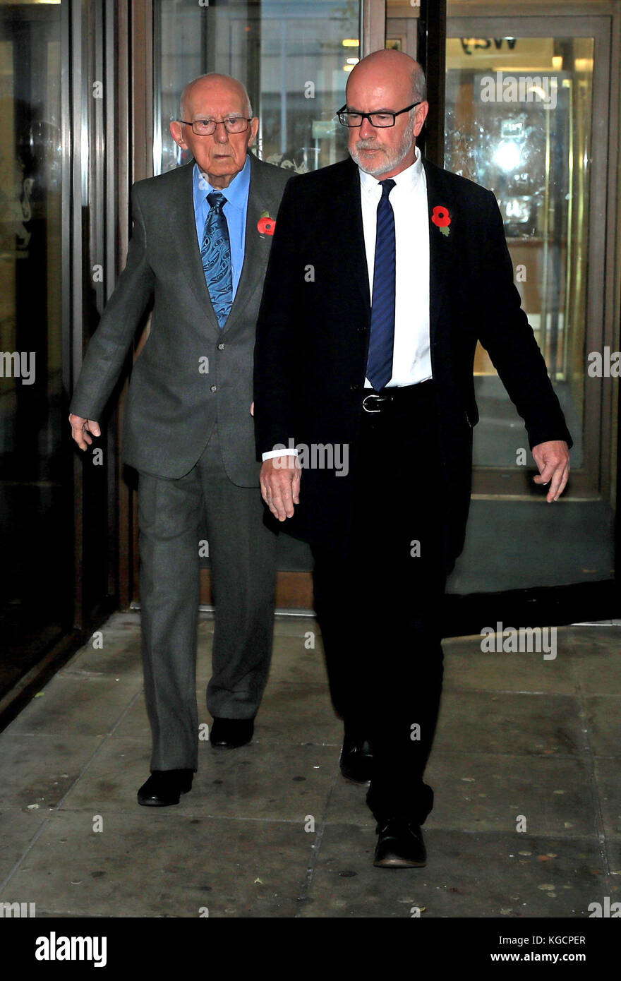 90-year-old Philip Bull (left) leaves Manchester Crown Court, where a ...