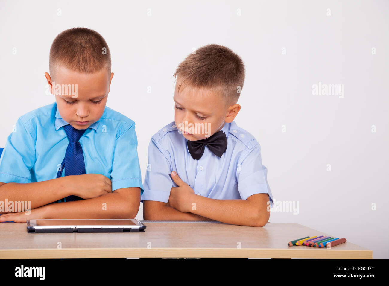 boys learn lessons Internet Tablet Stock Photo - Alamy