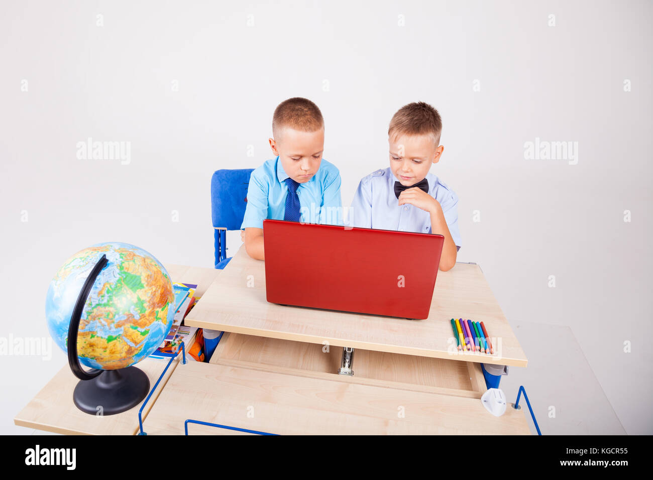 boys at a computer on the Internet school lessons Stock Photo - Alamy