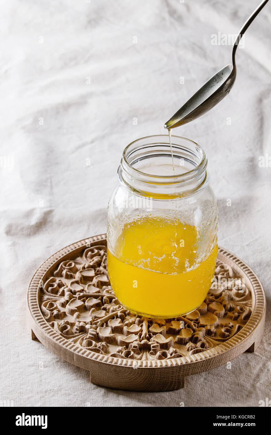 Glass of ghee butter Stock Photo - Alamy