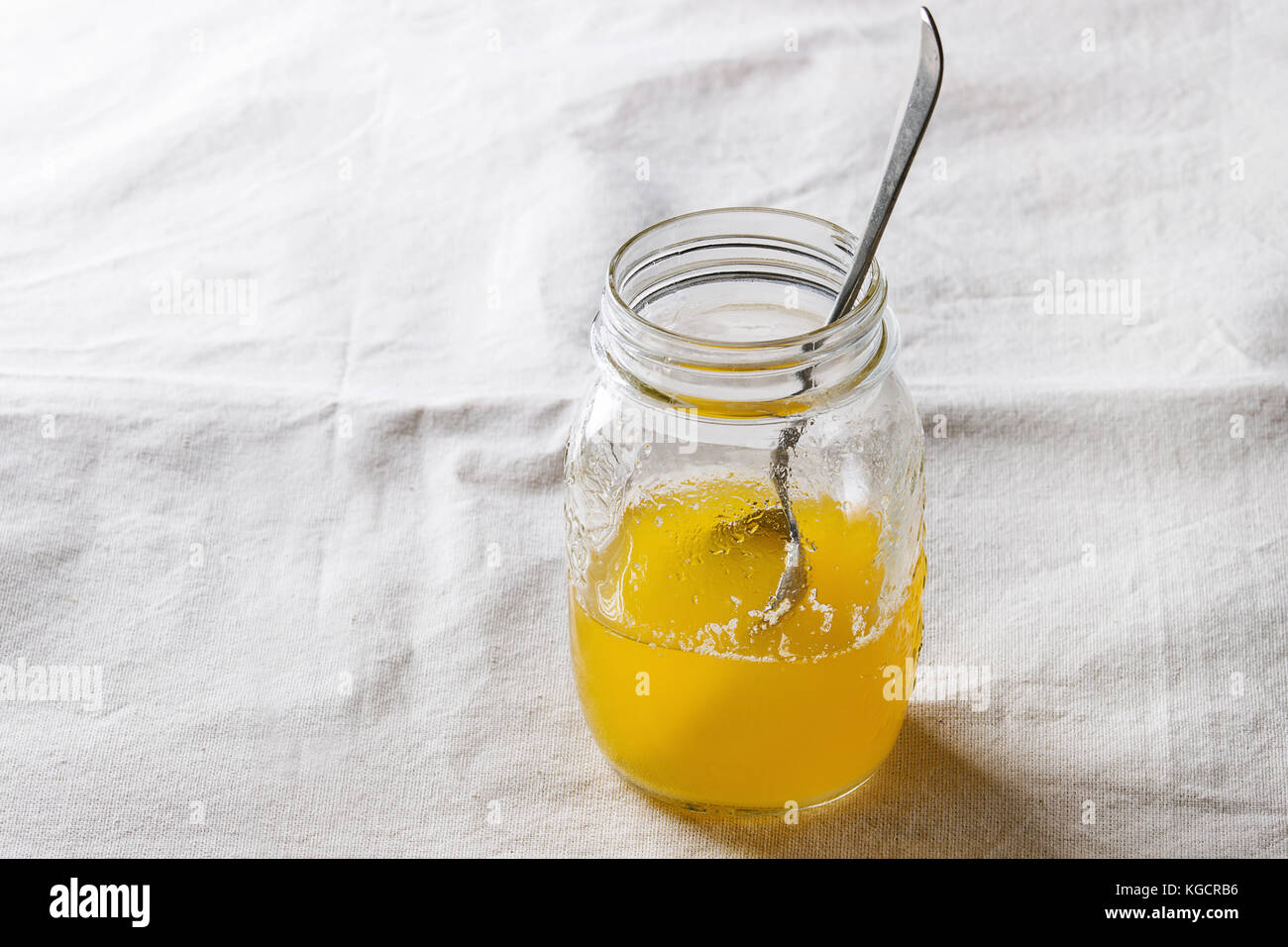 Glass of ghee butter Stock Photo - Alamy