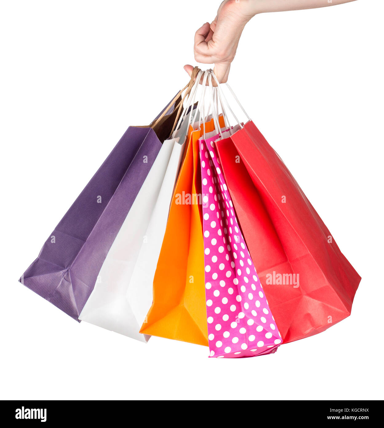 A woman hand carrying a bunch of colorful shopping bags with clipping ...