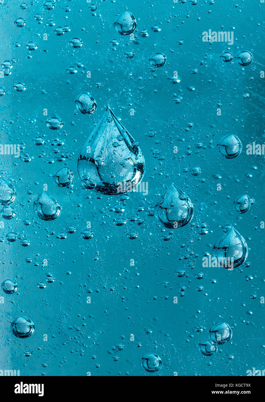 Water drop under water on background Stock Photo - Alamy