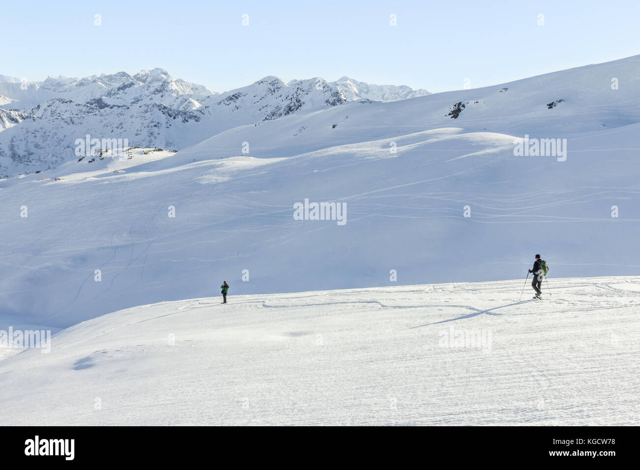 Two snowshoe hikers in alpine winter mountains. Bavaria, Germany Stock ...