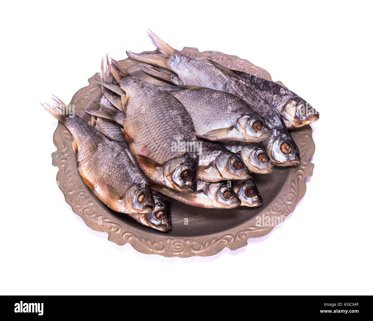raw fish ram on an iron plate, white background Stock Photo - Alamy