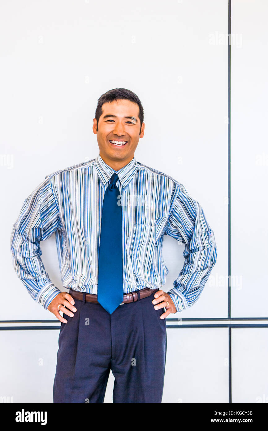 Laughing man hands on hips hi-res stock photography and images - Alamy