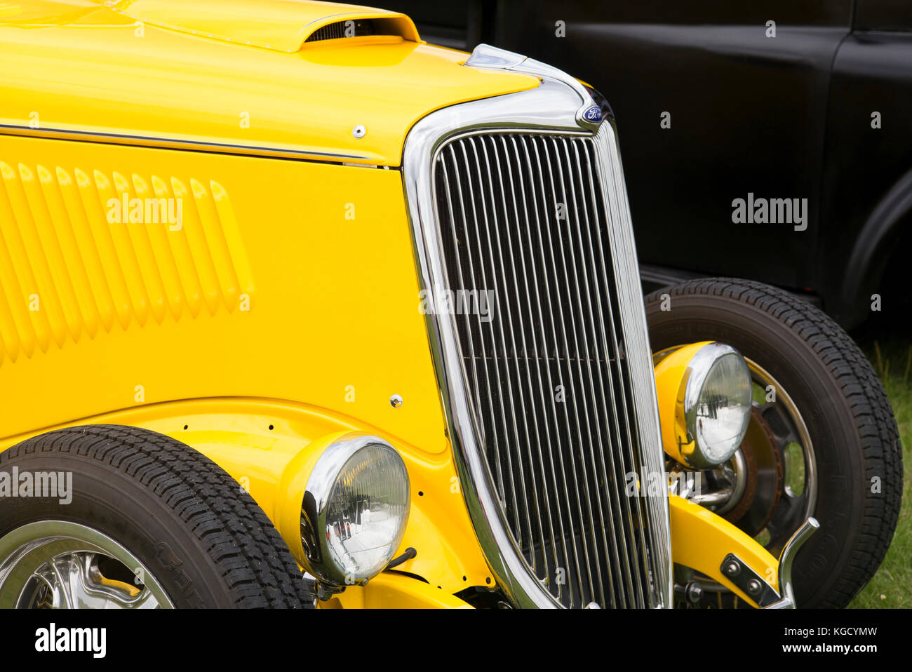 1934 Yellow Ford street rod coupe at an american car show, Essex ...