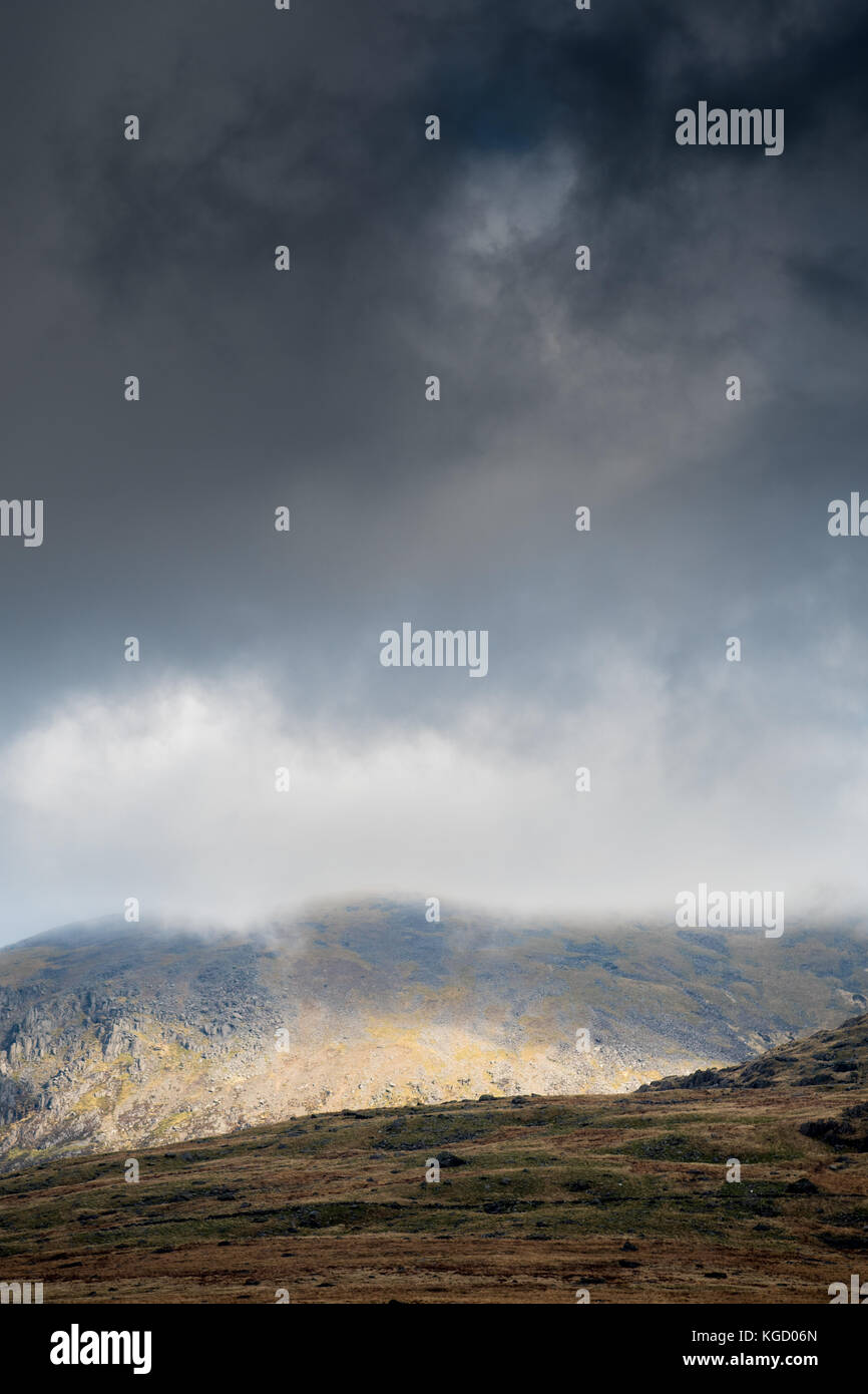 Mount Snowdon in cloud, as seen from Rhyd Ddu, Snowdonia, Wales, UK ...