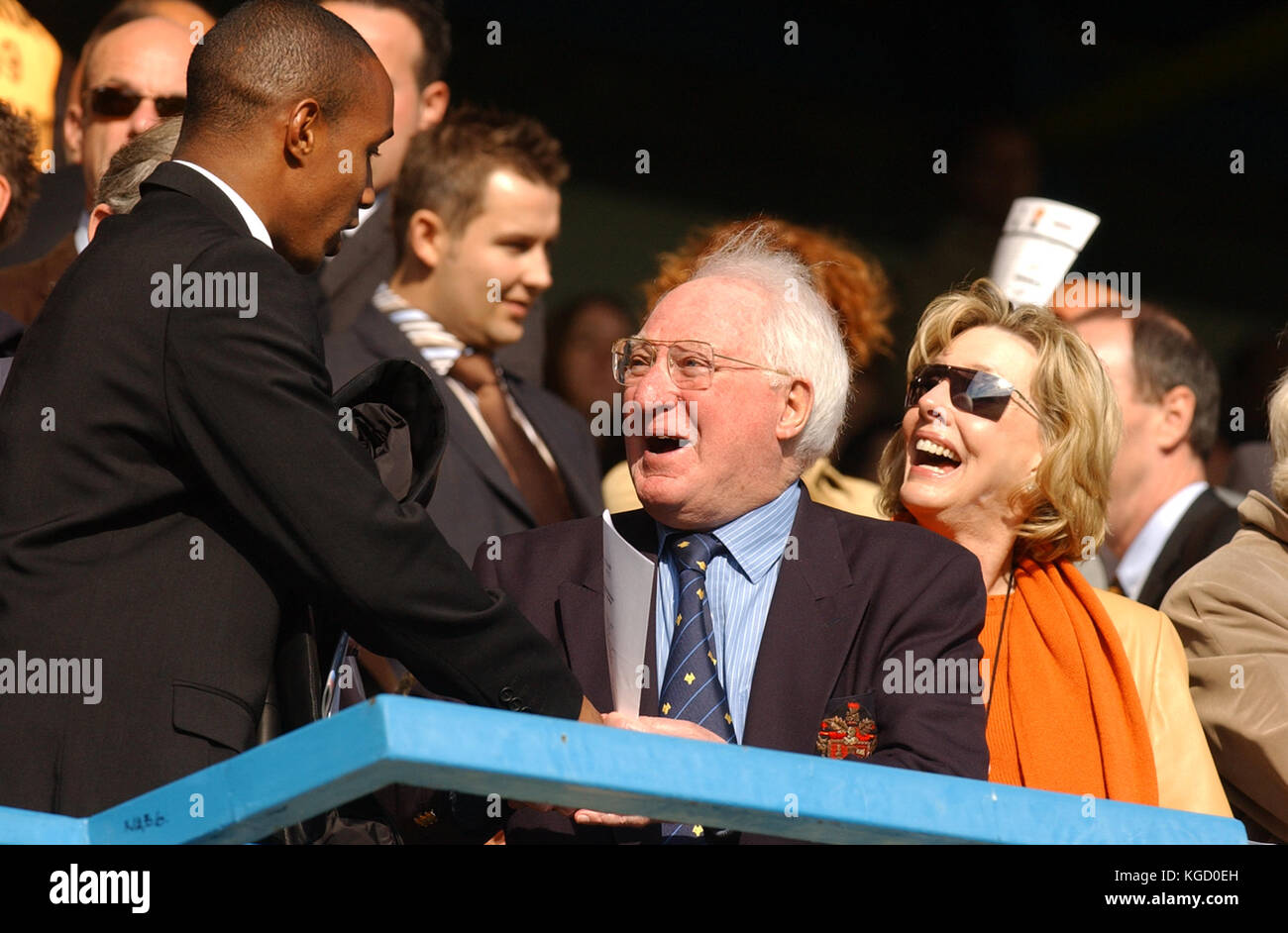 Football club owner Sir Jack Hayward shaling hands with Paul Ince ...