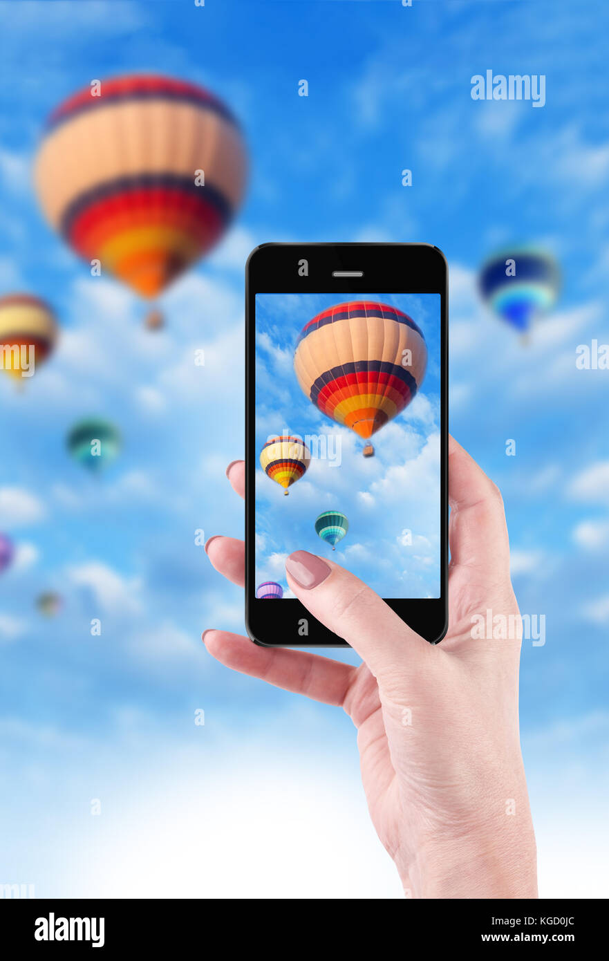 Female Hands Holding Smart Phone Displaying Photo of Blue Sky with Hot ...