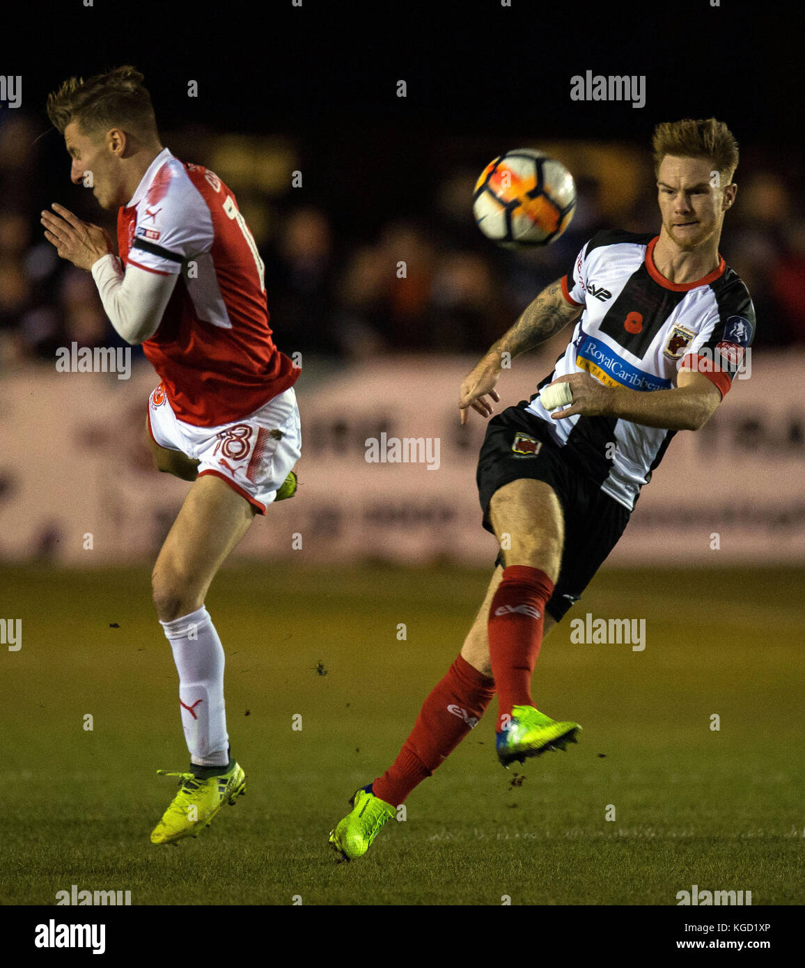 Chorley's Marcus Carver in action with Fleetwood's George Glendon ...