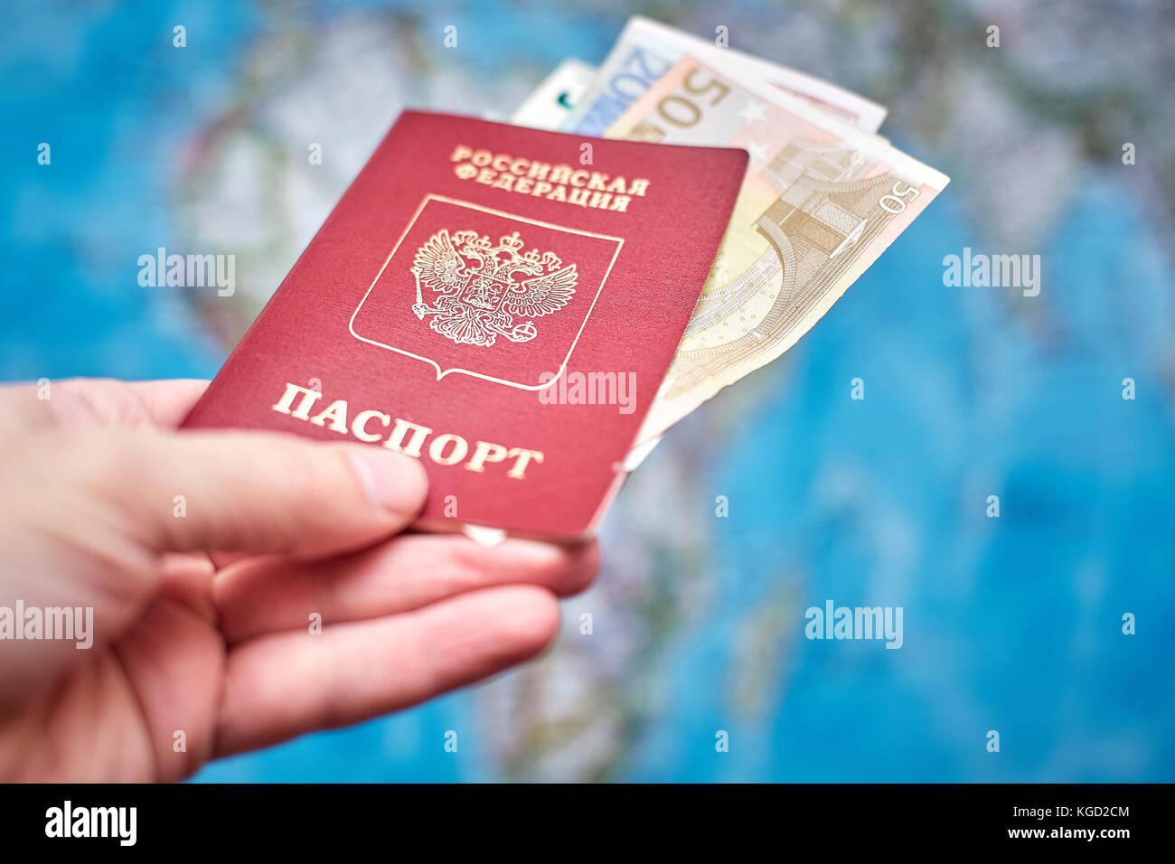 Russian passport and Euro banknotes on the map background Stock Photo ...