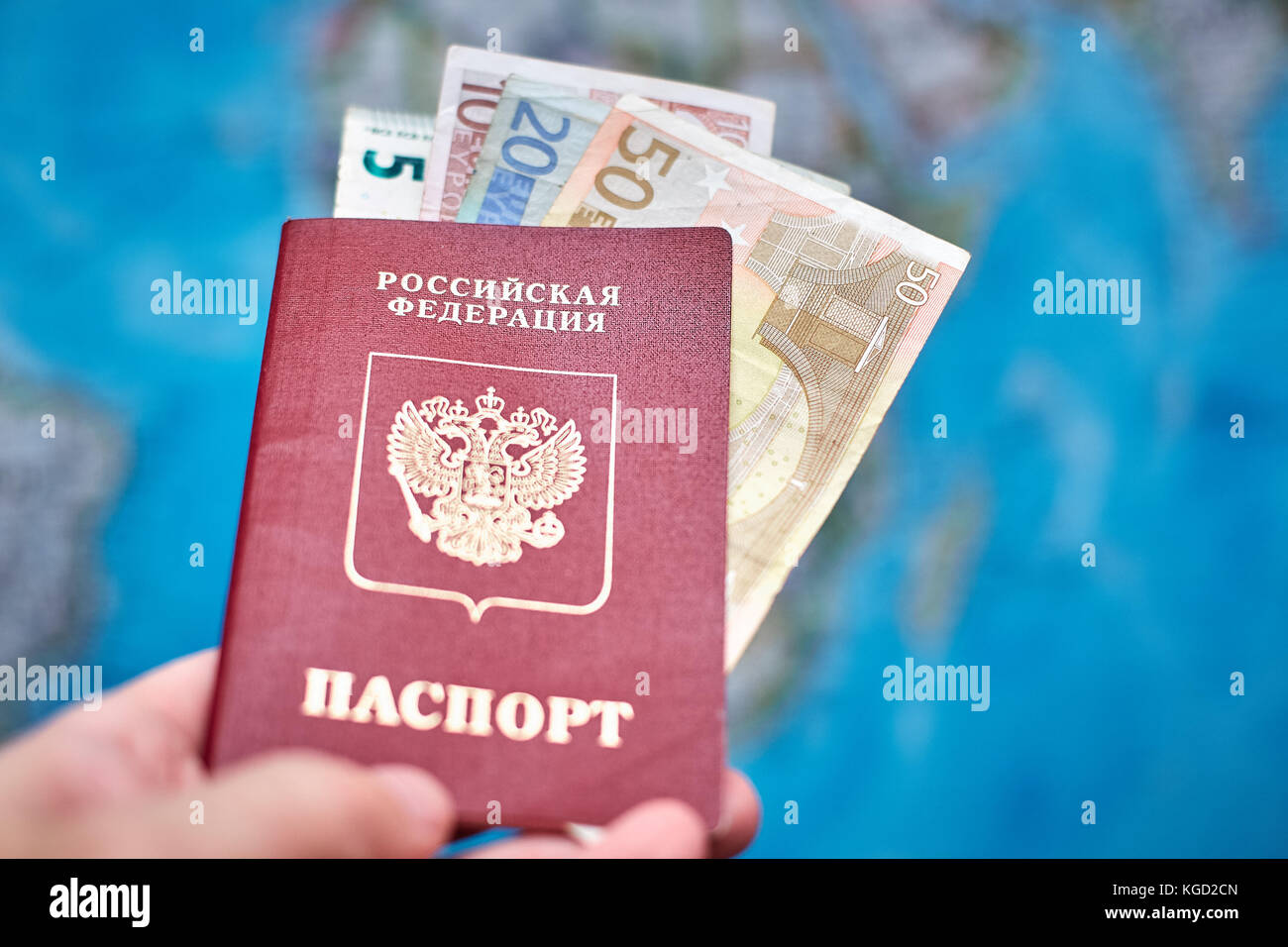Russian passport and Euro banknotes on the map background Stock Photo ...