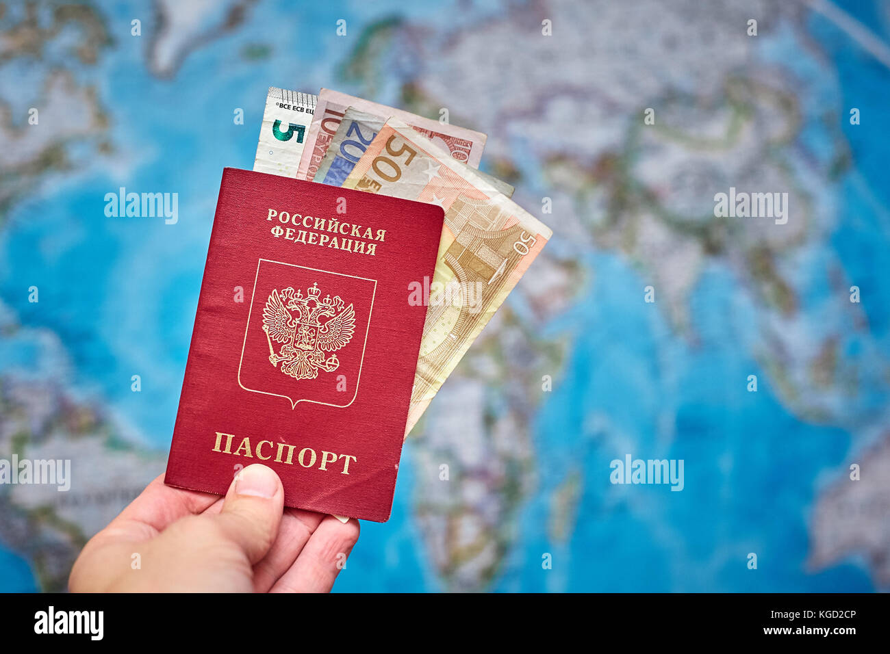 Russian passport and Euro banknotes on the map background Stock Photo ...
