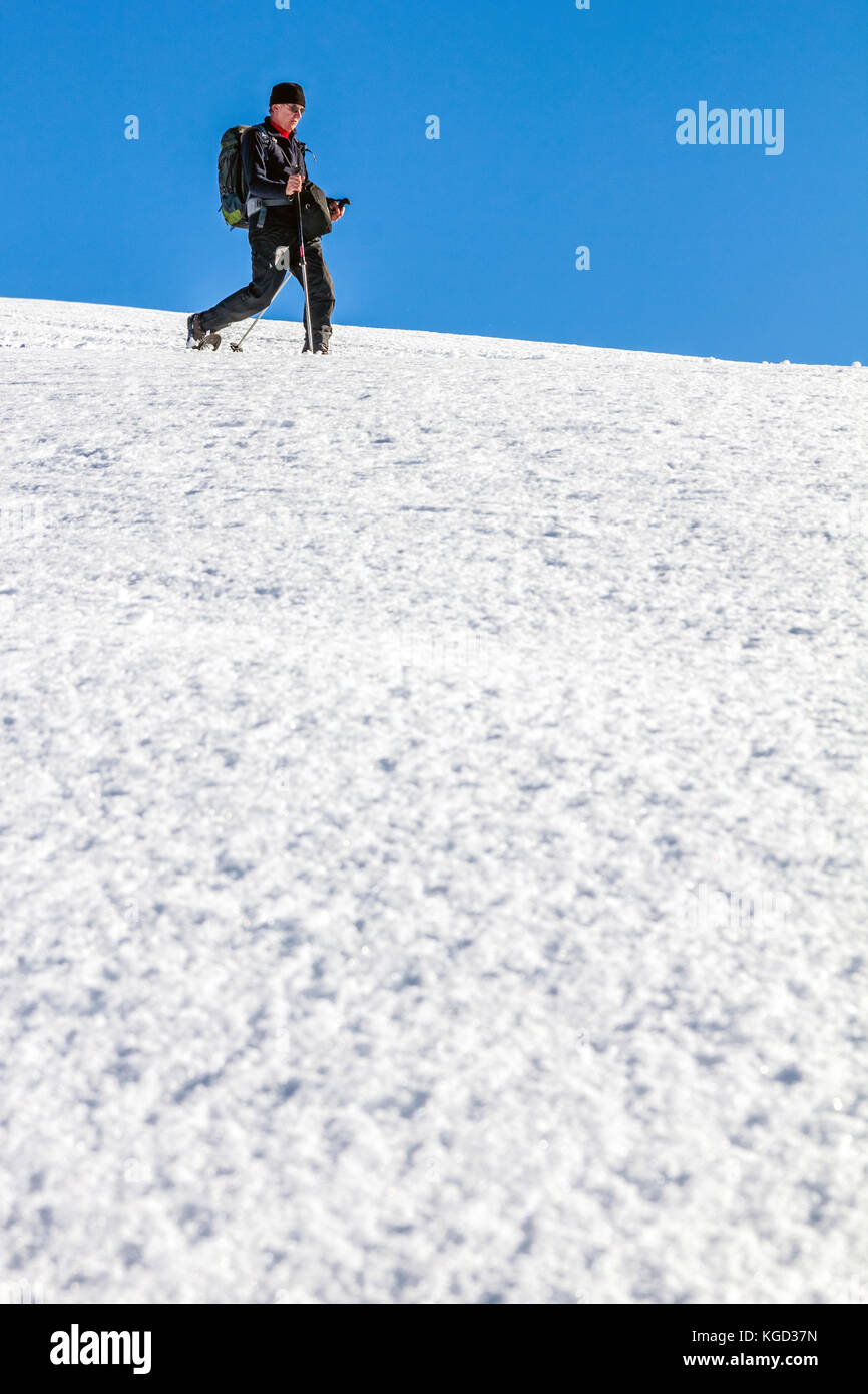 Person snowshoeing through snow hi-res stock photography and images - Alamy
