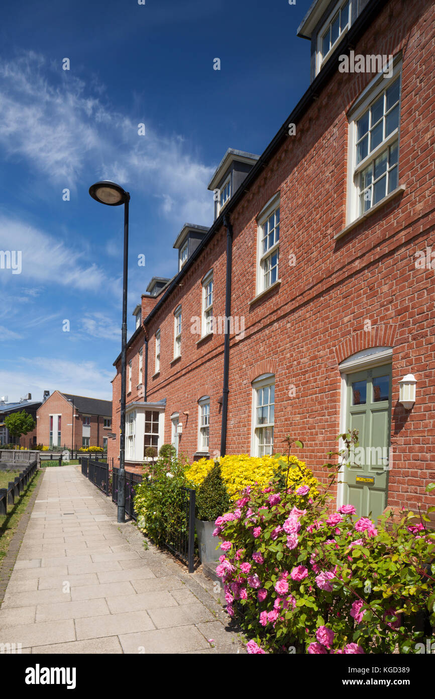 A row of modern suburban terrace houses at Upton Stock Photo - Alamy