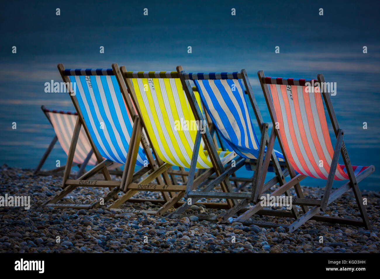Empty deck chairs on a beach Stock Photo - Alamy