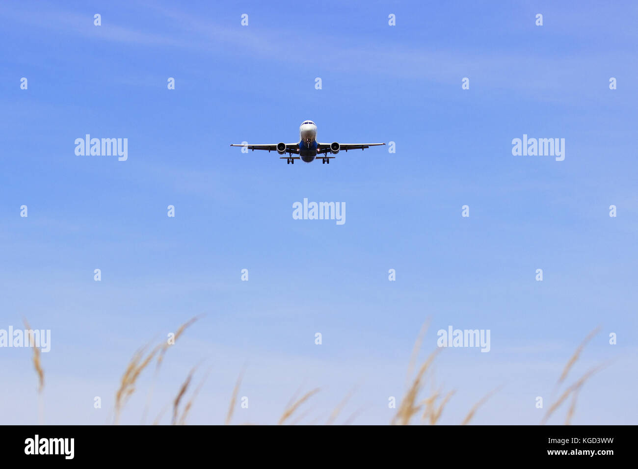 Plane flying through clouds in the sky. Jet aircraft in the air Stock ...